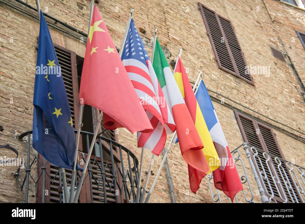 Building with several different flags - Italy Stock Photo - Alamy