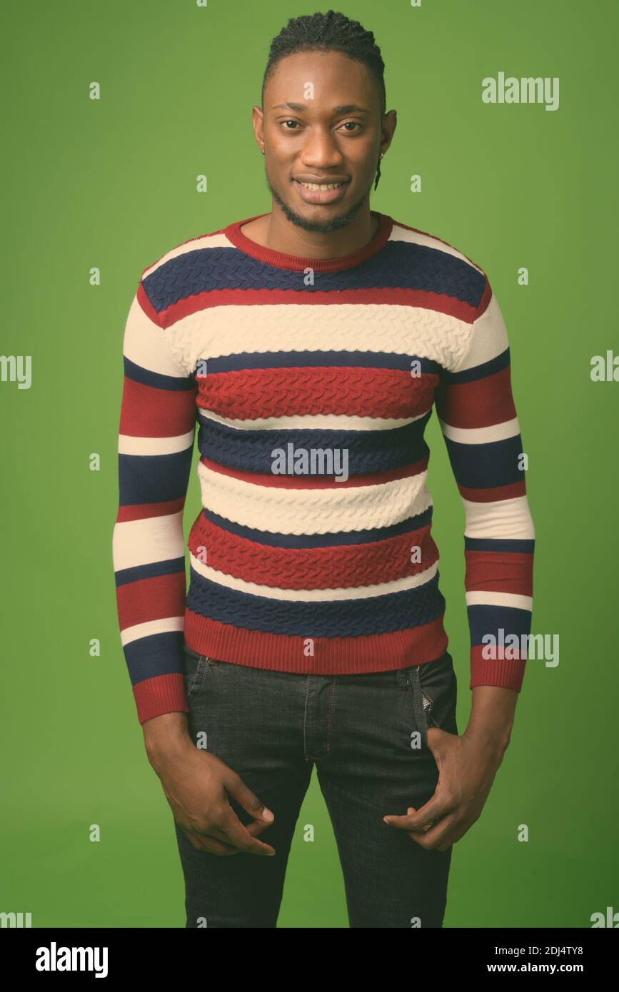 Young handsome African man from Kenya against green background Stock ...