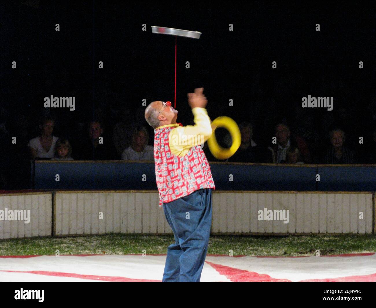 CLOWN in the circus manegen shows his tricks Stock Photo - Alamy