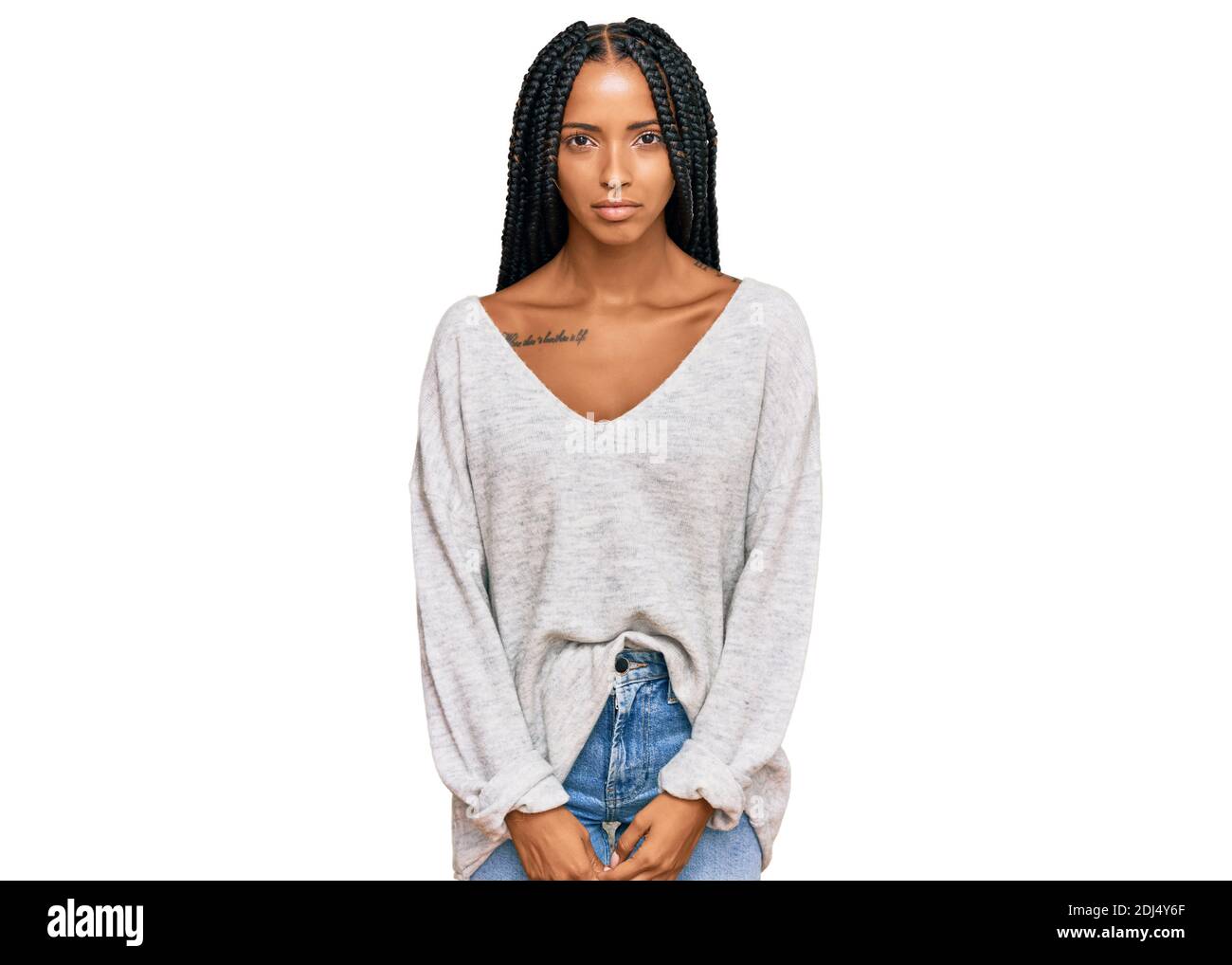 Beautiful hispanic woman wearing casual clothes depressed and worry for ...