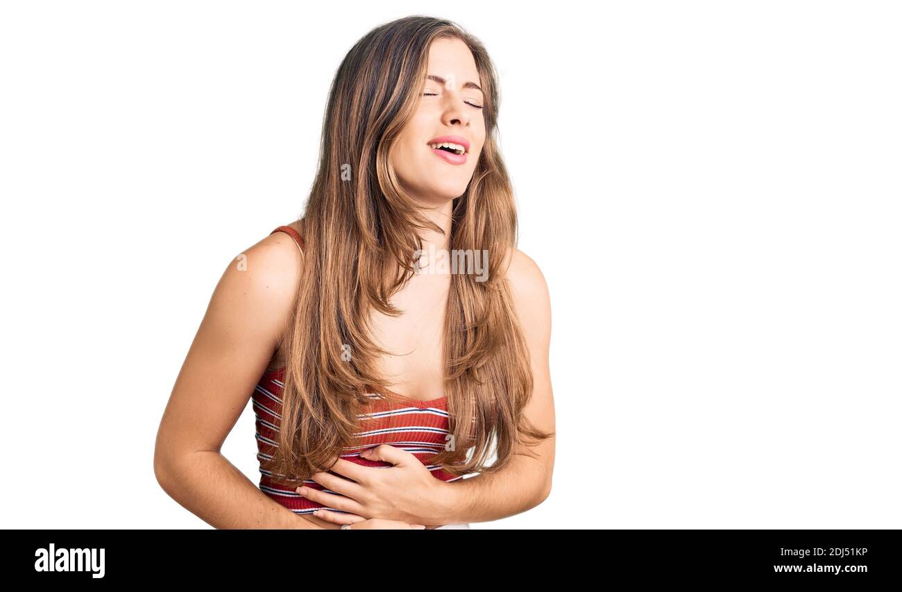 Beautiful caucasian young woman wearing casual clothes with hand on ...