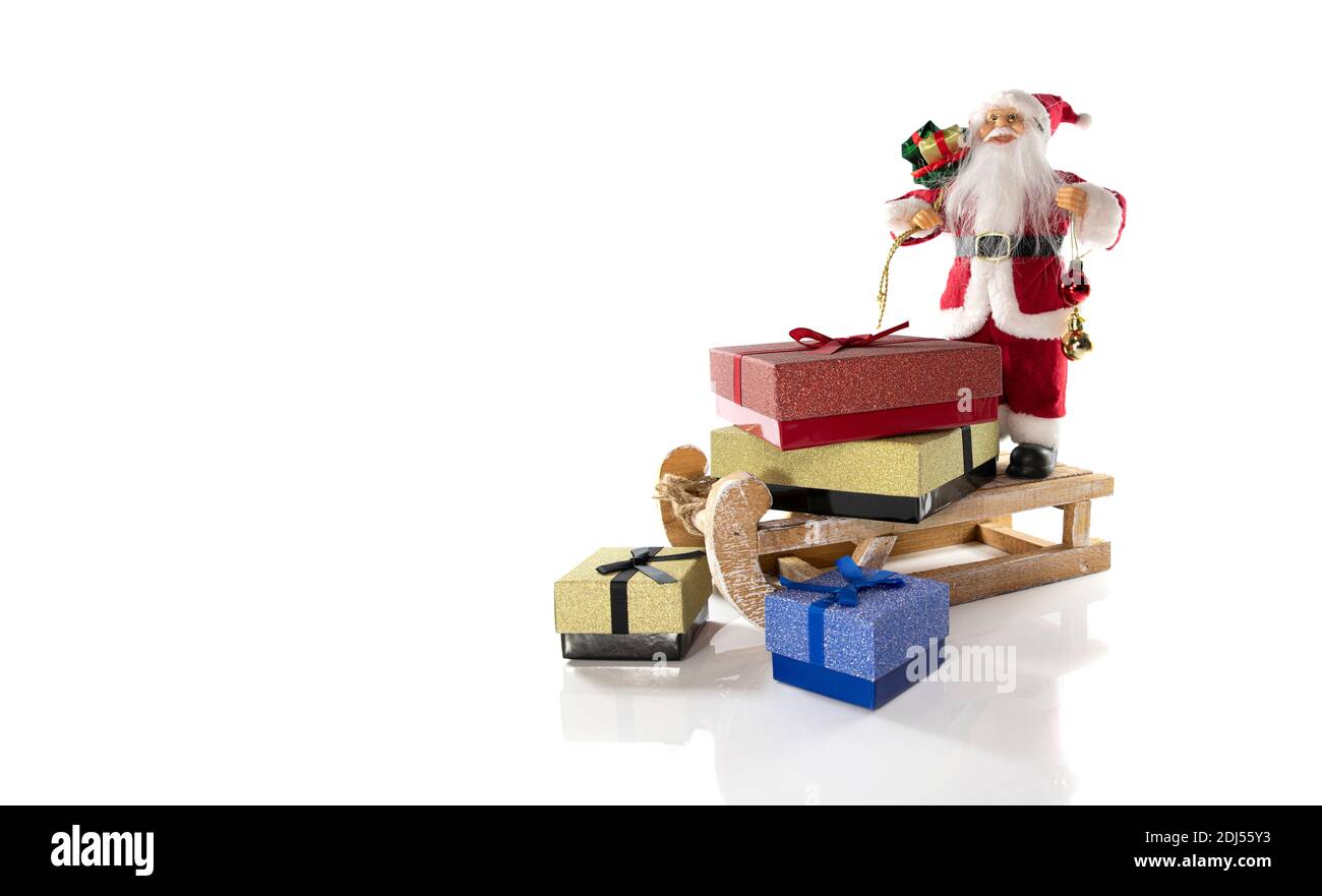 Santa Claus on the sledge with presents for christmas isolated on white ...