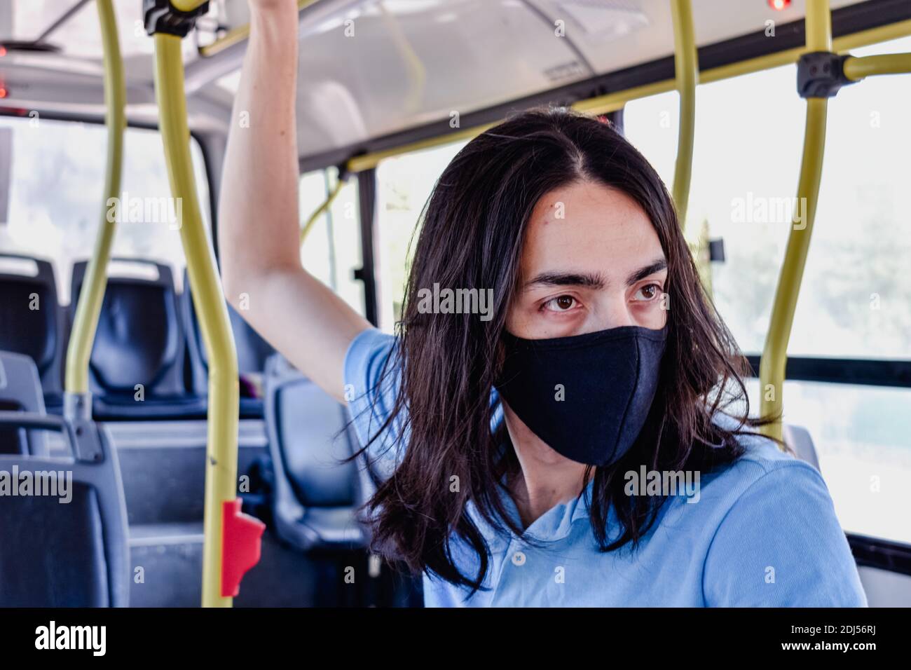 Man wearing mask pushing hi-res stock photography and images - Alamy
