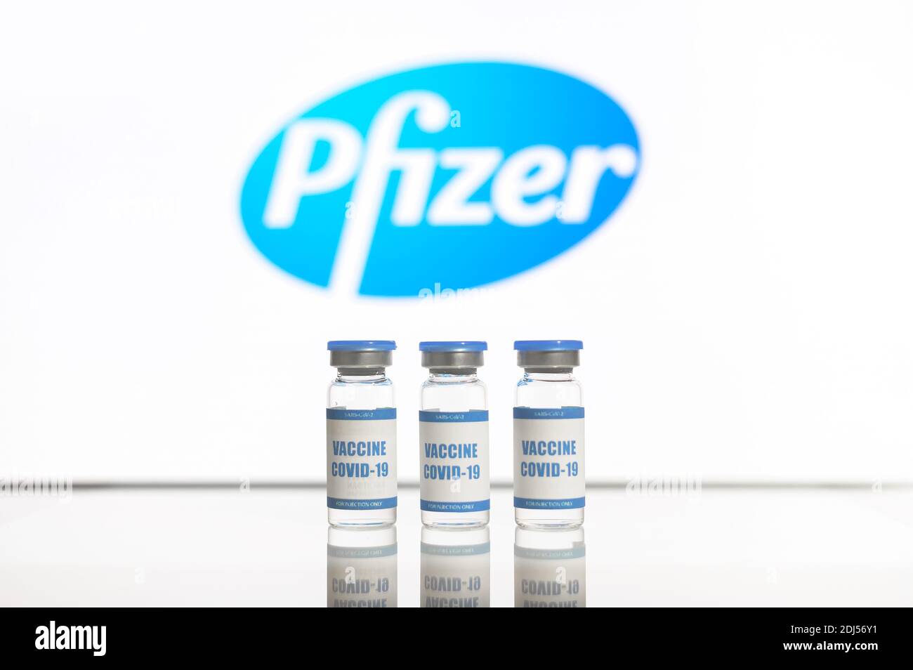 Vials of pfizer vaccine isolated on white with logo Stock Photo - Alamy