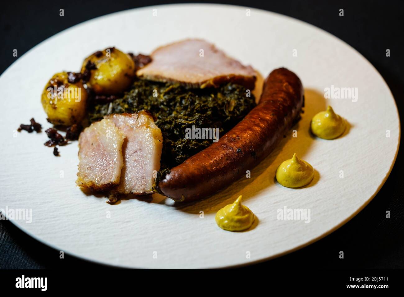traditional northern german Food curly Kale with pork Bacon and ...