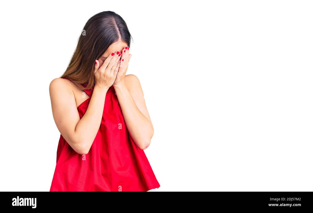 Beautiful Brunette Young Woman Wearing Casual Clothes With Sad