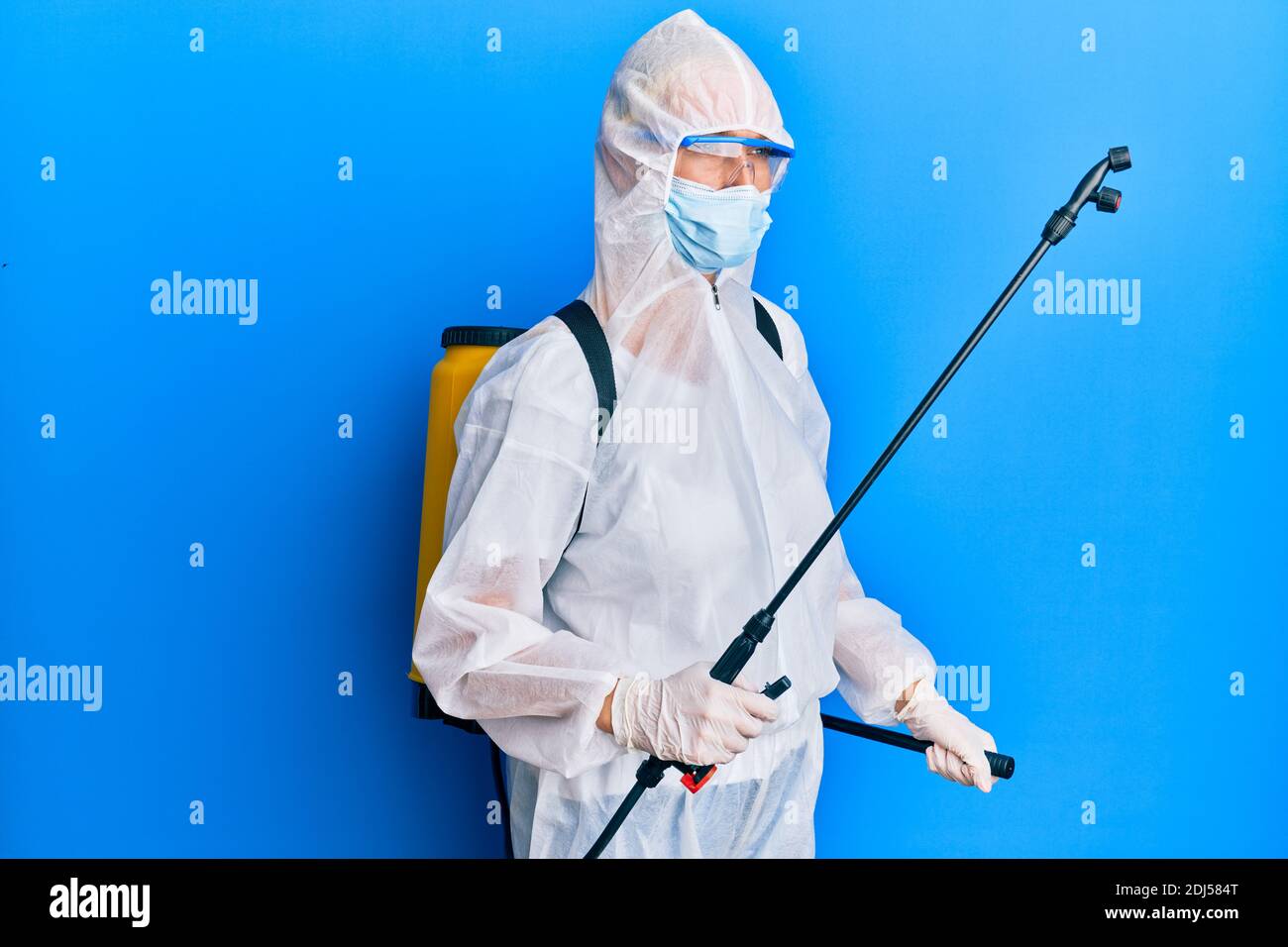 Covid specialist wearing decontamination protective suit and ...