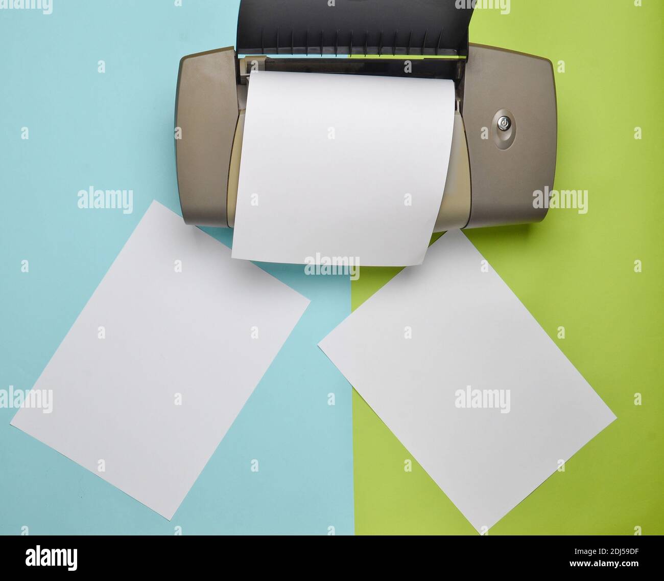 A printer with blank paper forms on a colored pastel background. Top ...