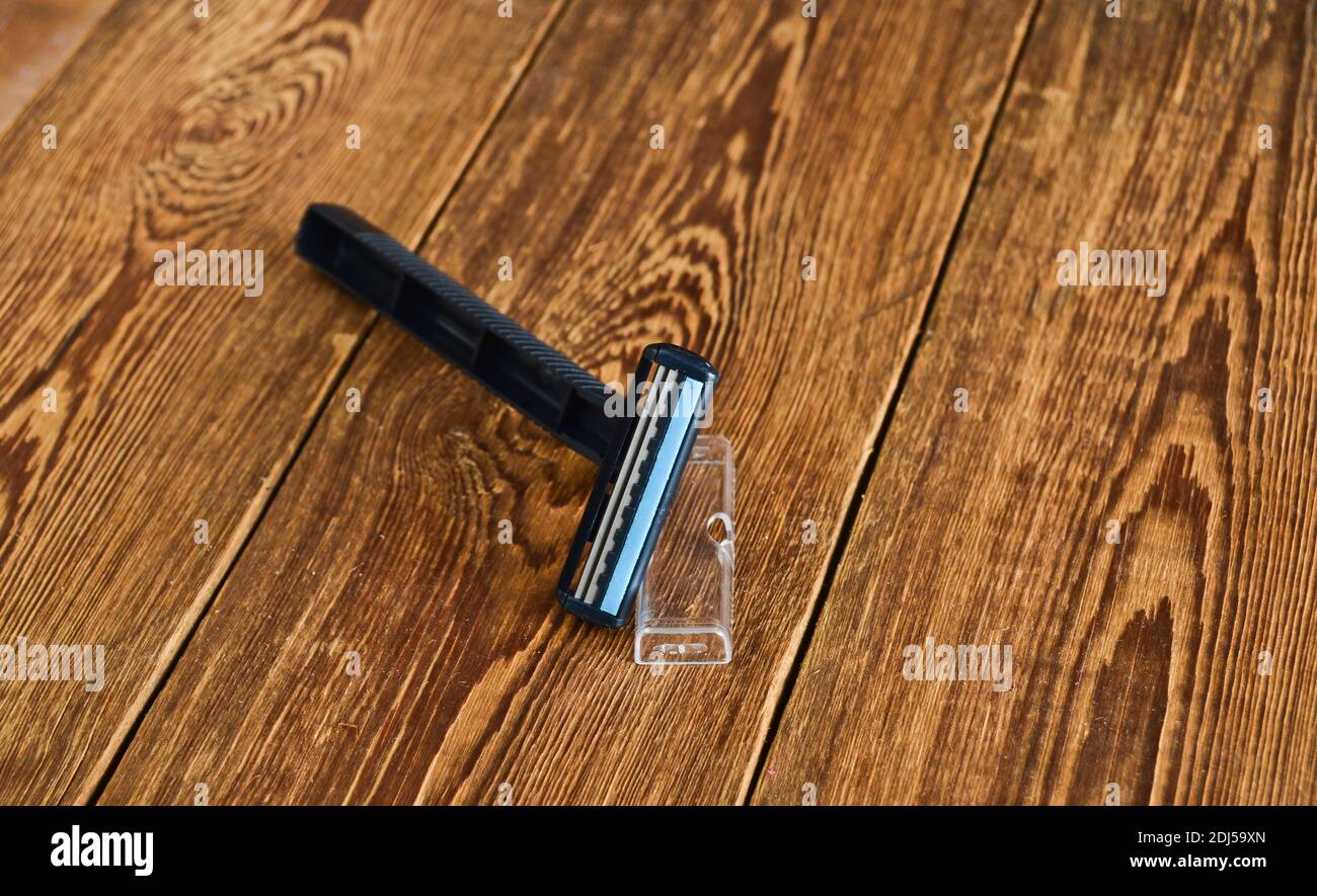Man shaving legs hi-res stock photography and images - Alamy