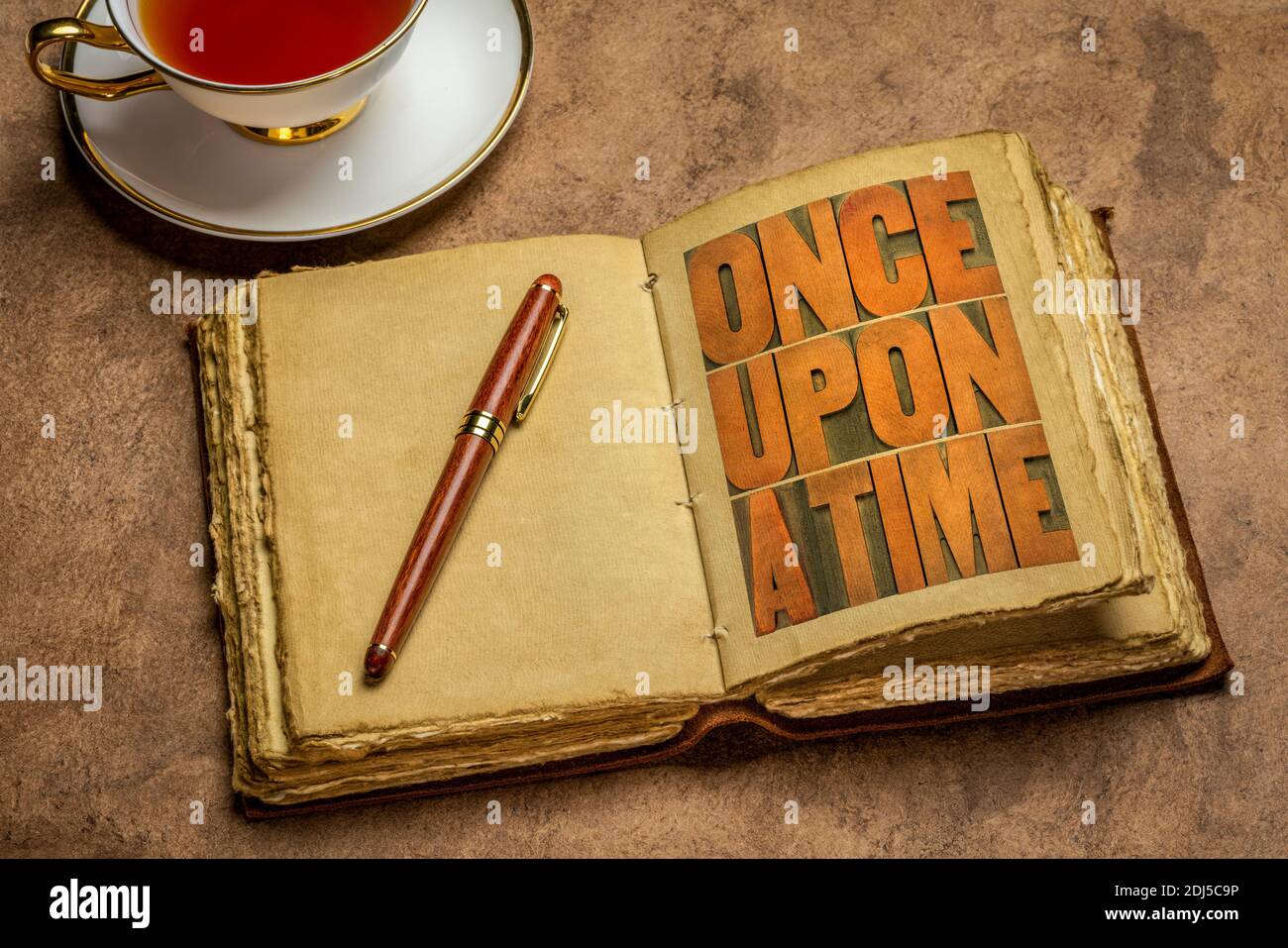 once upon a time opening phrase - storytelling concept - wood type word ...