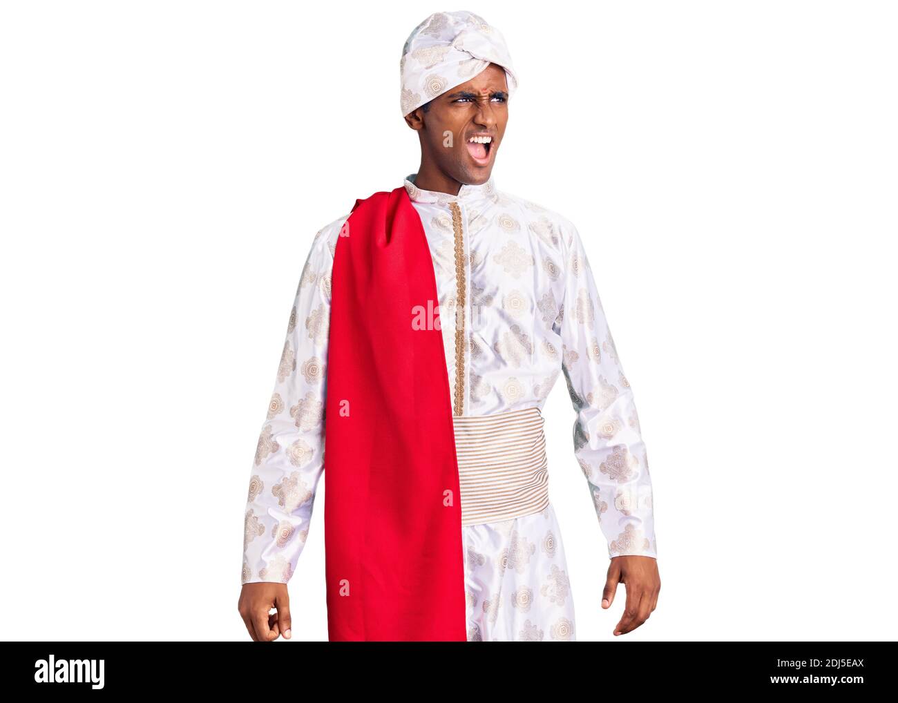 African handsome man wearing tradition sherwani saree clothes angry and ...