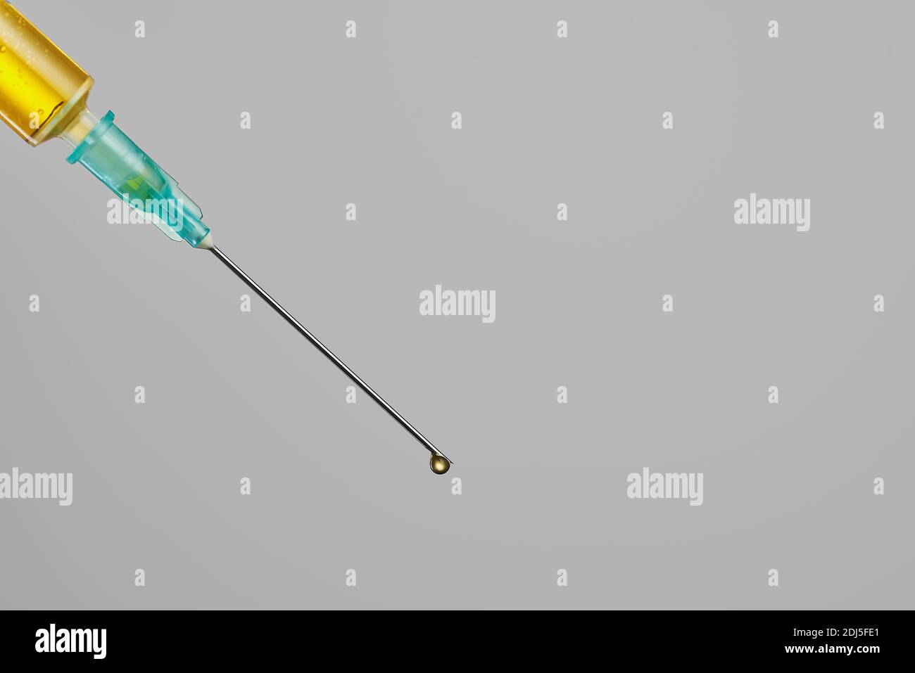 medical syringe on bottom gray background Gray Stock Photo - Alamy