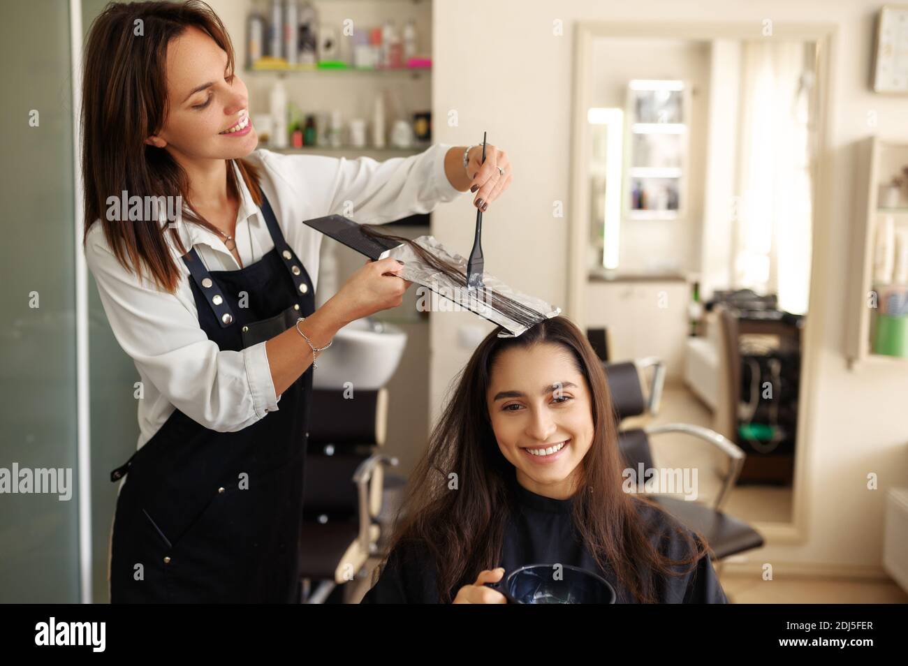 Female hairdresser works hi-res stock photography and images - Alamy