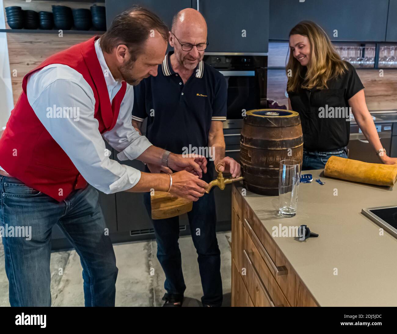 Tapping a beer keg in Kemnath-Waldeck, Germany Stock Photo - Alamy