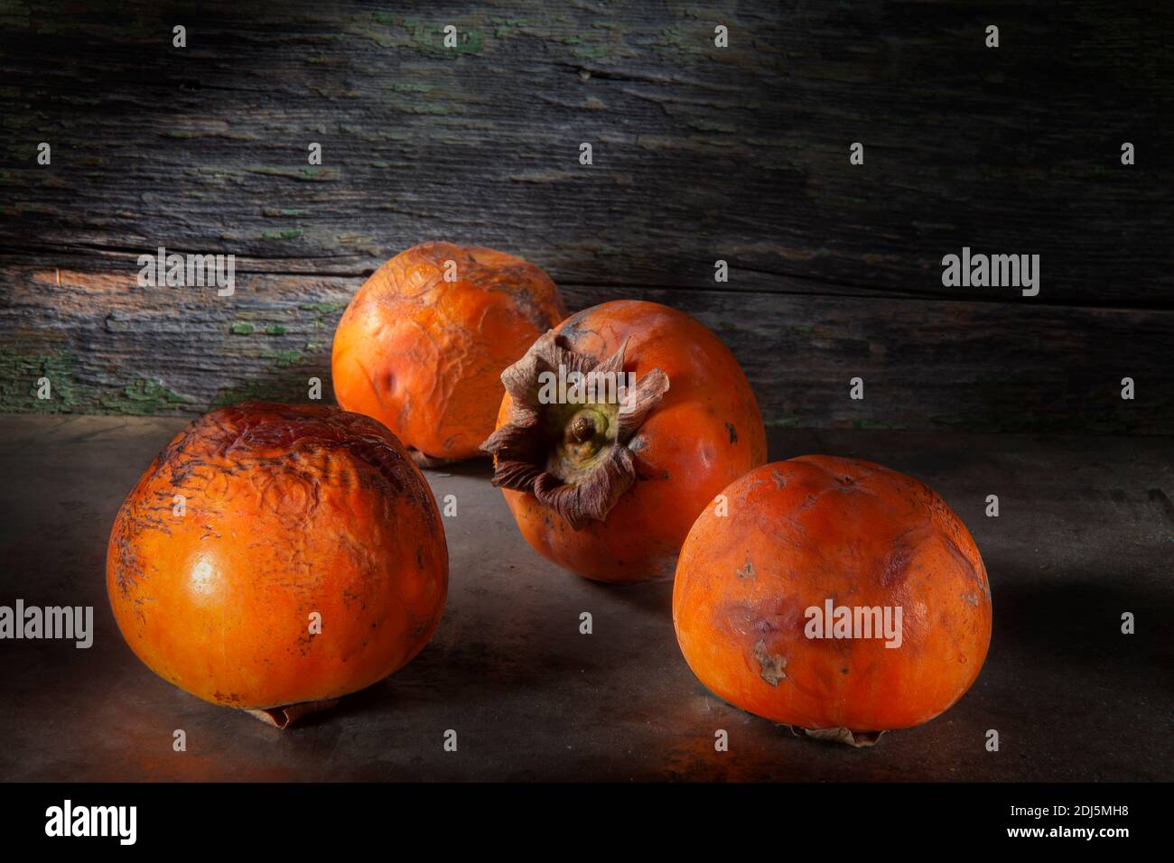 Four Very Ripe and Sweet Persimmon Fruits. The last Phase of Ripening ...