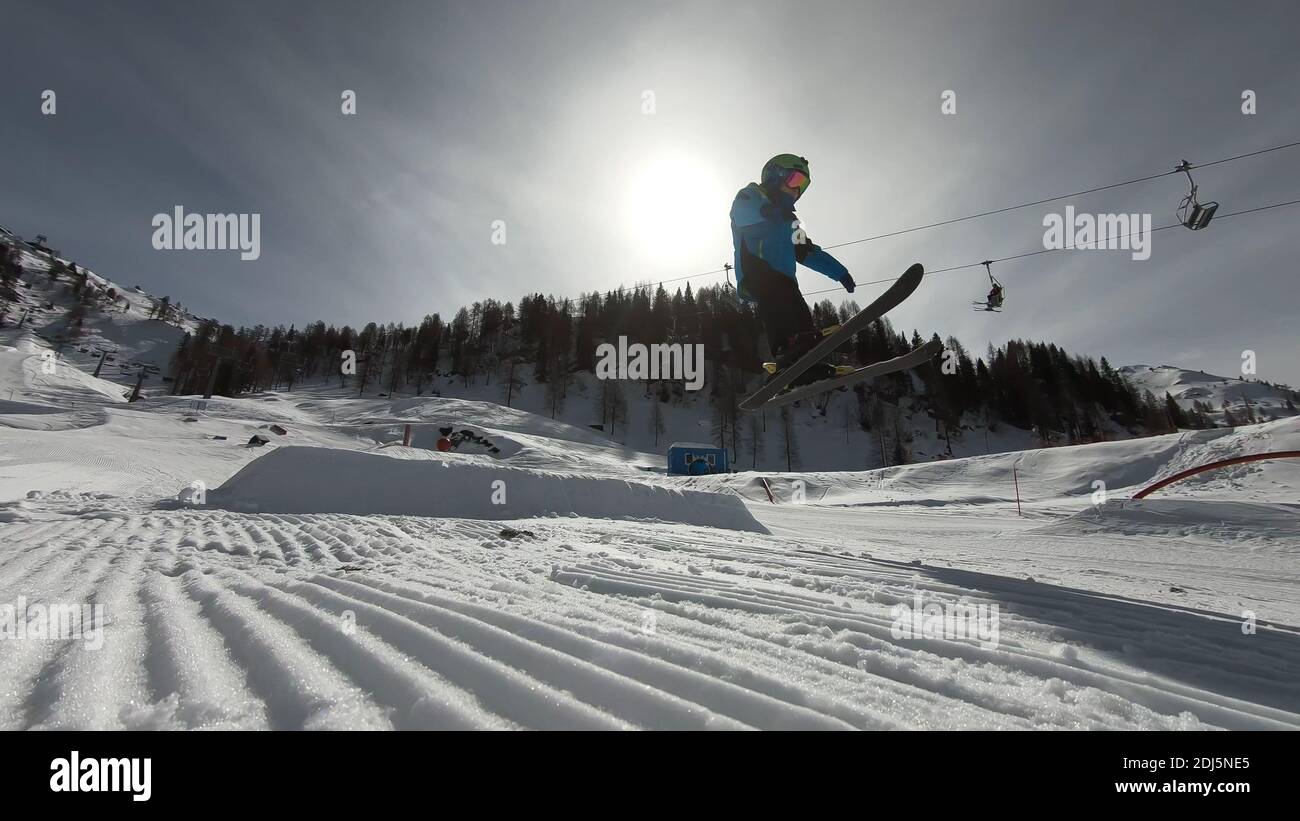 Little boy skiing. A 6 year old child enjoys a winter holiday in the ...