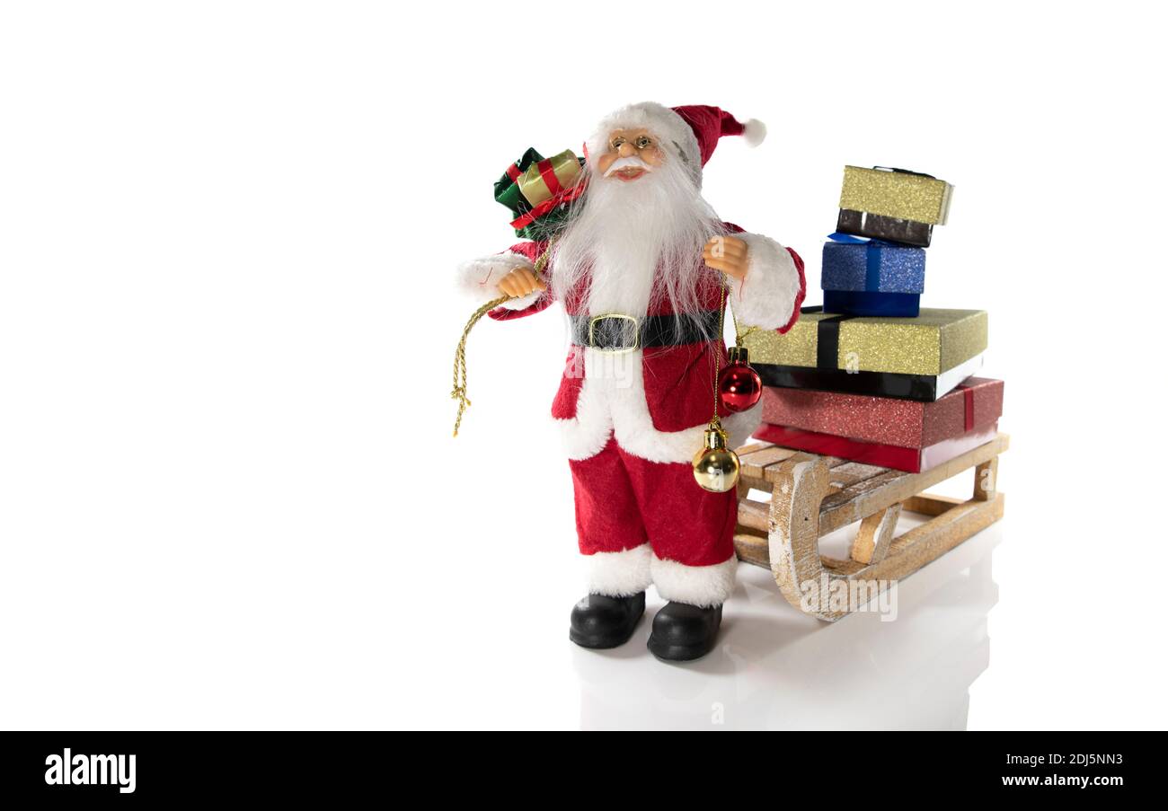 Santa Claus on the sledge with presents for christmas isolated on white ...