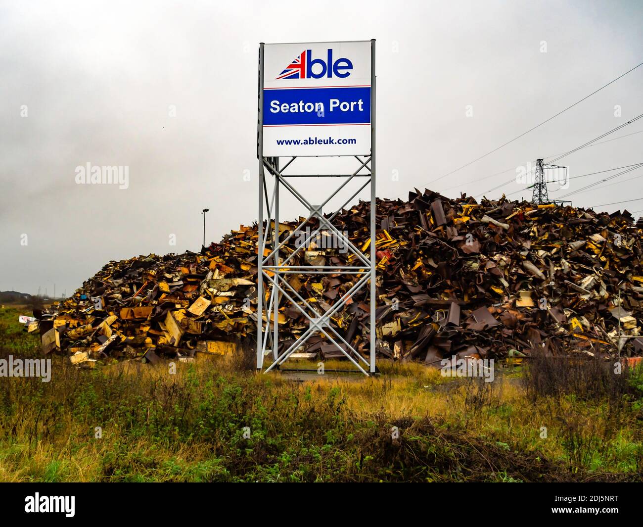 Able Seaton Port Sign in front of a pile of cut up steel ready for ...