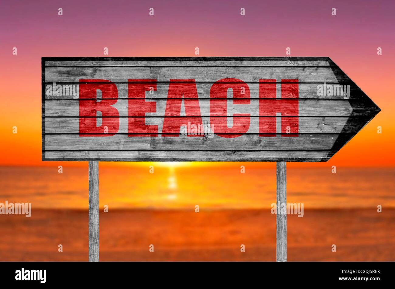 Red Beach wooden sign with on beach background Stock Photo - Alamy