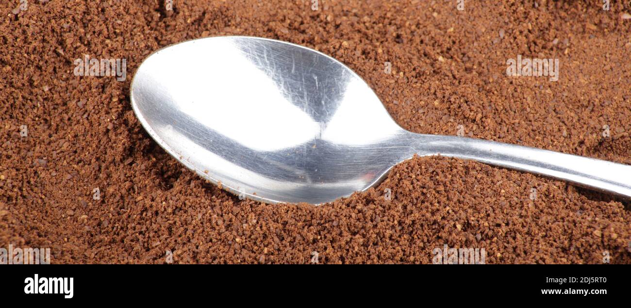 milled coffee and one teaspoon Stock Photo - Alamy