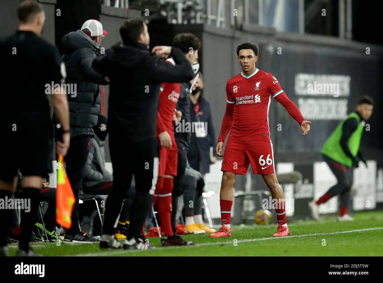Liverpool's Trent Alexander-Arnold leaves the game after being ...
