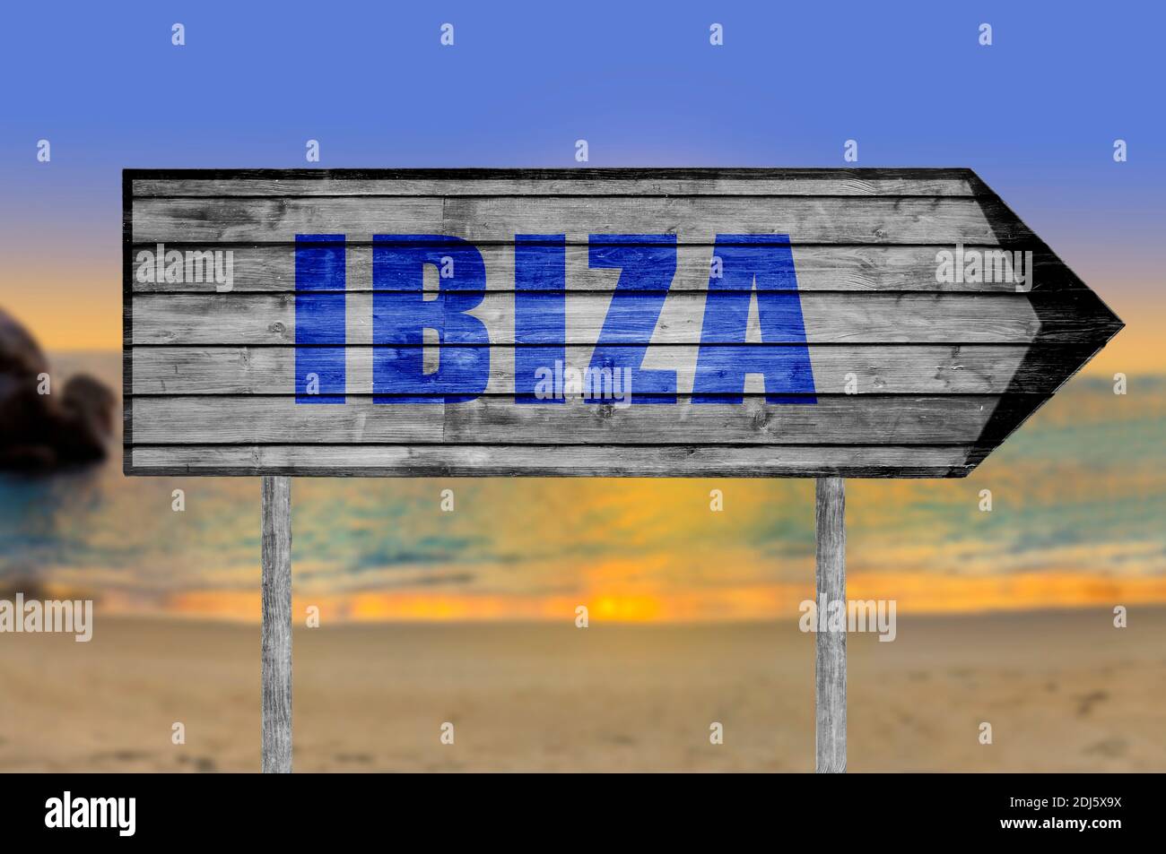 Ibiza wooden sign with beach background Stock Photo - Alamy