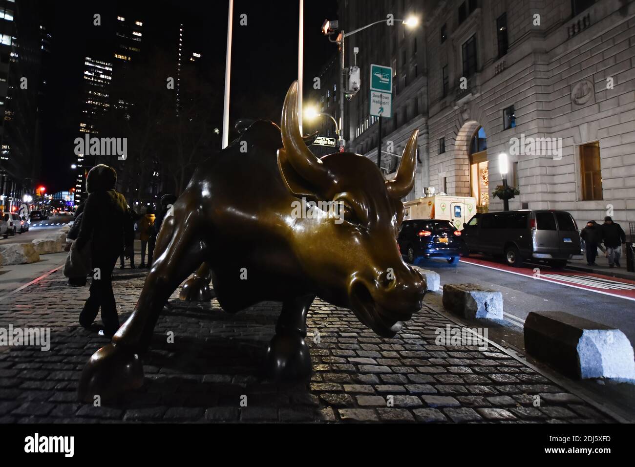 New York, USA, November 2019. Charging Bull in Lower Manhattan, New York City at night Stock ...
