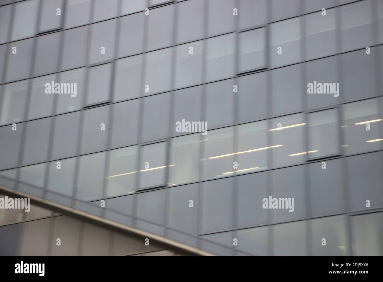 Old factory windows texture with blue sky reflections Stock Photo - Alamy
