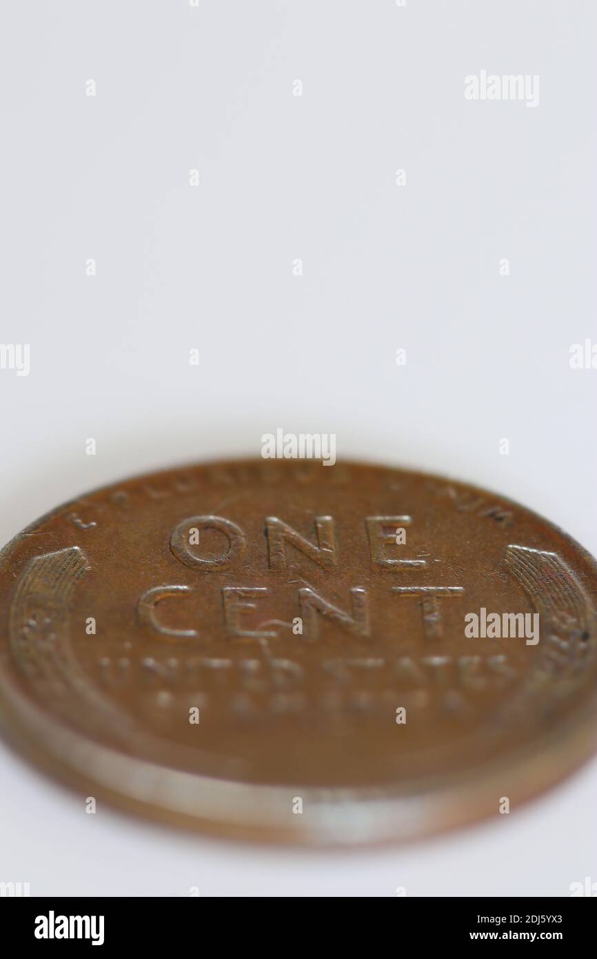 Macro close-up of one cent coin on white background with copy space and ...