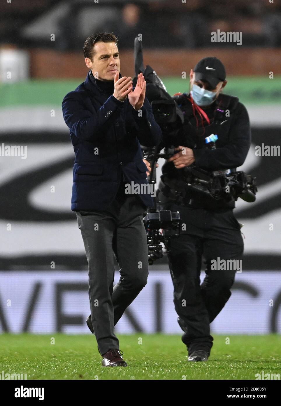 Fulham manager Scott Parker on the pitch as he applauds the fans after ...