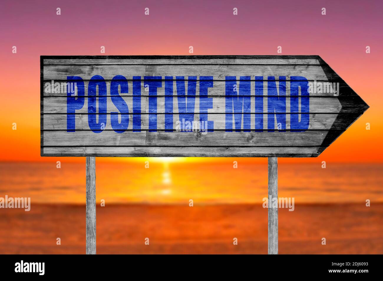 Positive mind wooden sign with on a beach background Stock Photo - Alamy