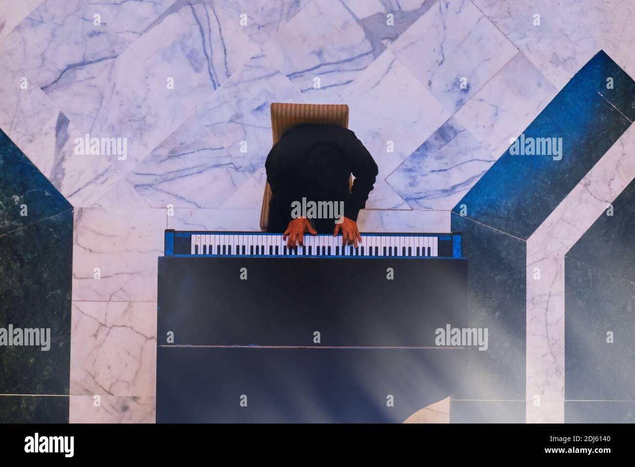 Musician playing a musical instrument, top view Stock Photo - Alamy