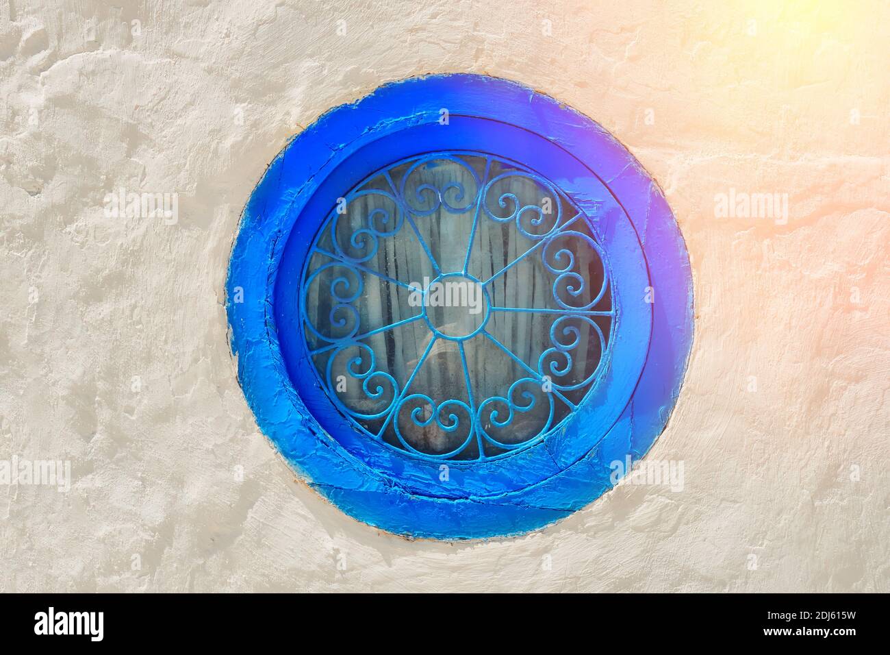 Beautiful blue round-shaped window with decorative arabic lattice, Sidi ...