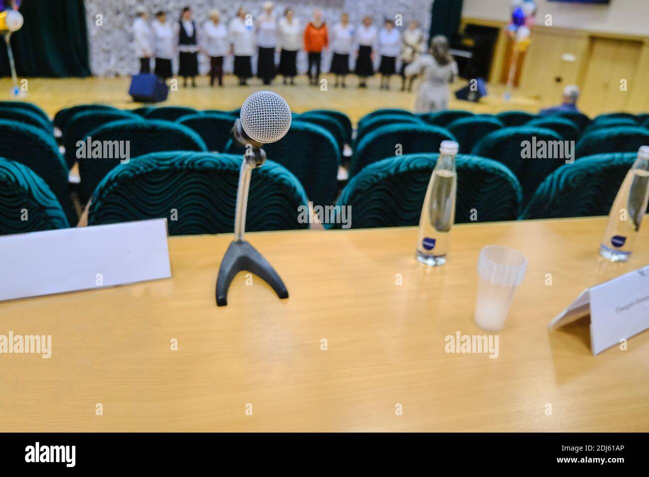 View of the stage from the jury table with microphone. Place for judges ...
