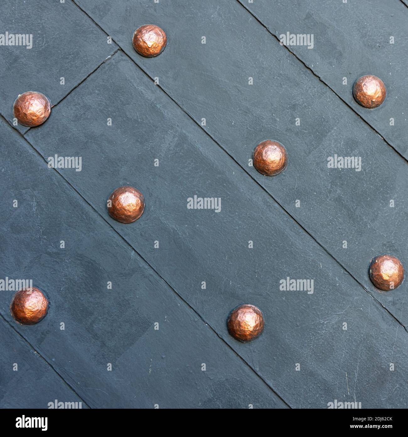 Old metal door with rivets, Instagram format Stock Photo - Alamy