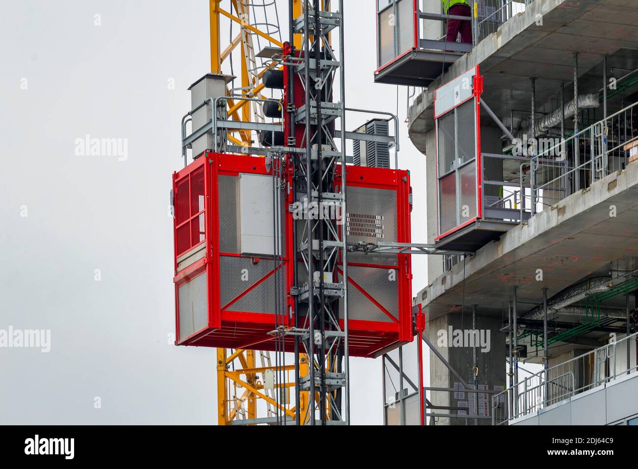 Elevator lifts for workers and material at the construction site Stock ...