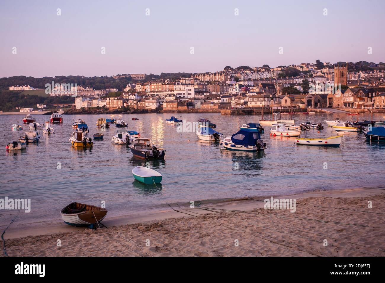 Cornish Harbour showing boats and village Stock Photo - Alamy