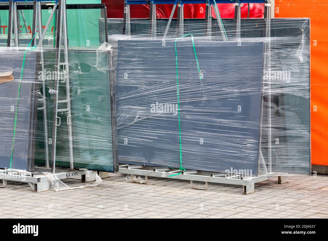 Window glass panels stacked on the stand at the construction site Stock ...