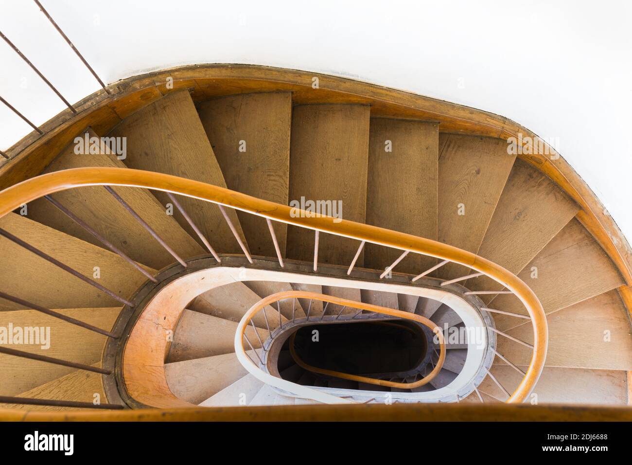 Historical wooden spiral staircase, the view from above architecture ...