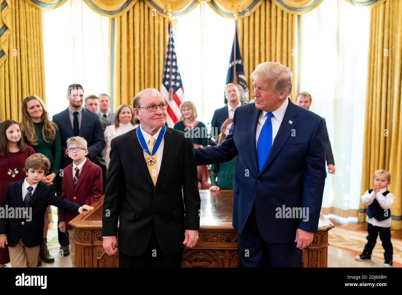 U.S President Donald Trump presents Olympic wrestling champion Dan ...