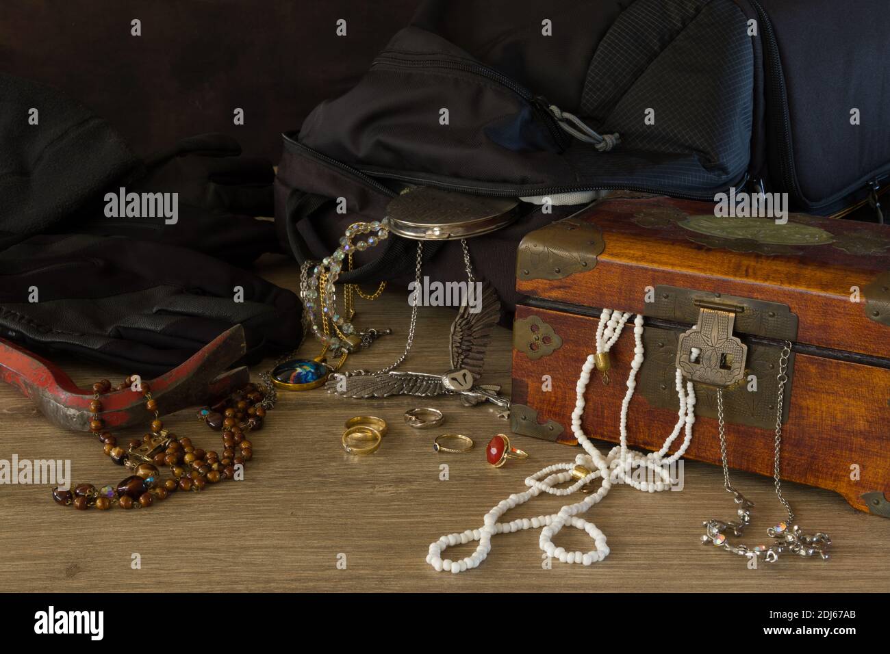 Tools used and the loot and jewels stolen by a thief during a burglary ...