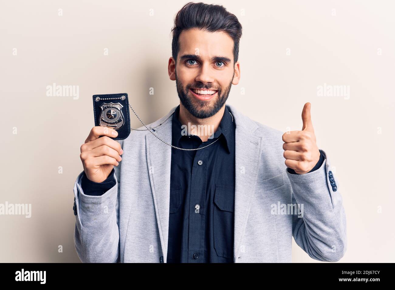 Police detective showing badge hi-res stock photography and images - Alamy