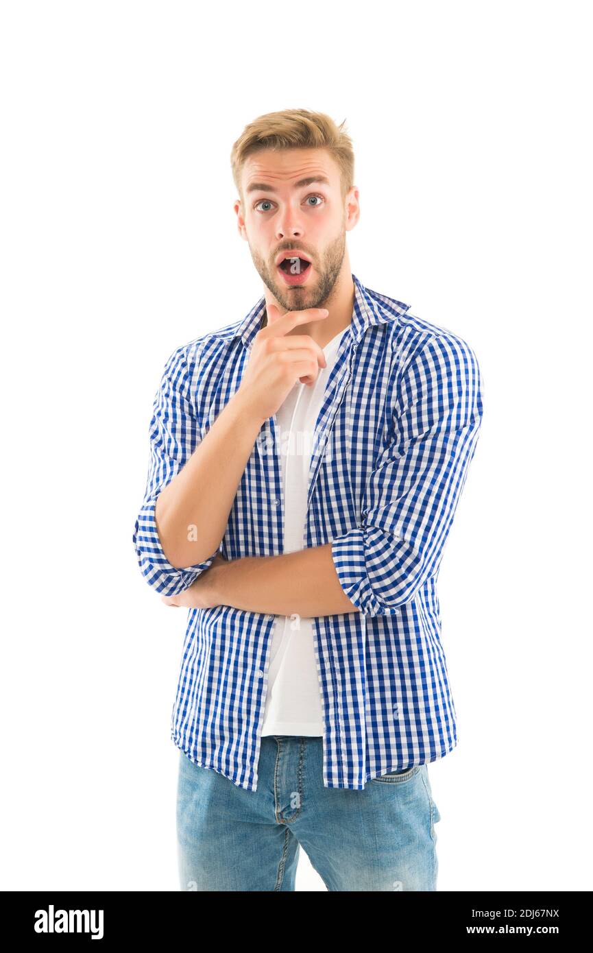 surprised handsome young man with stylish hair in checkered shirt ...