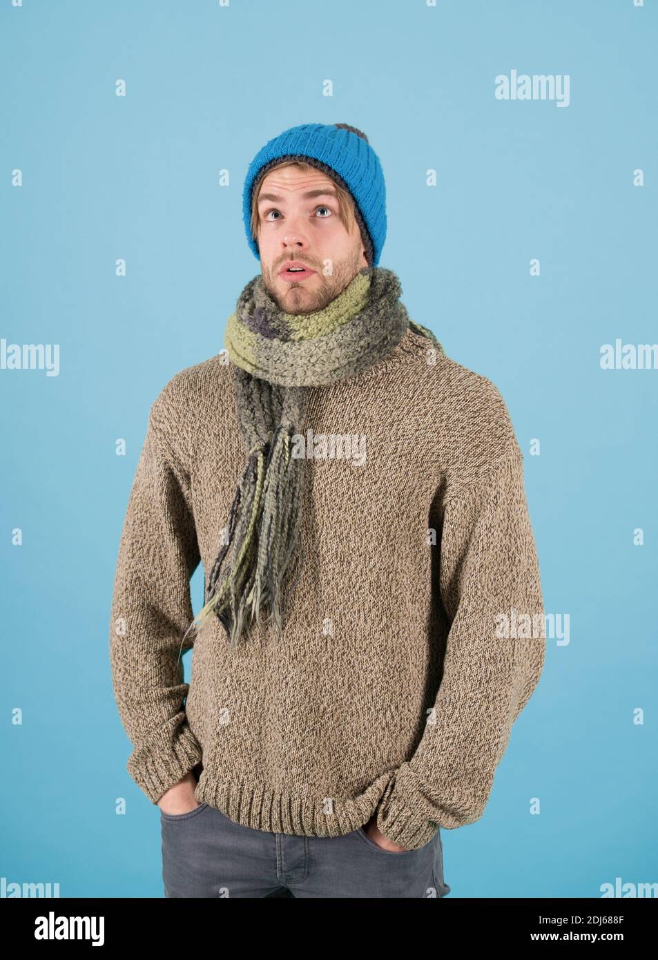 Homeless man in winter. Homeless man in winter clothes. Homeless ...