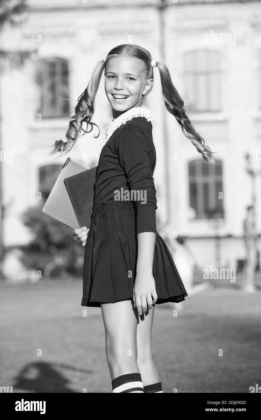 Study smart. Happy girl study in primary school. Little child hold ...