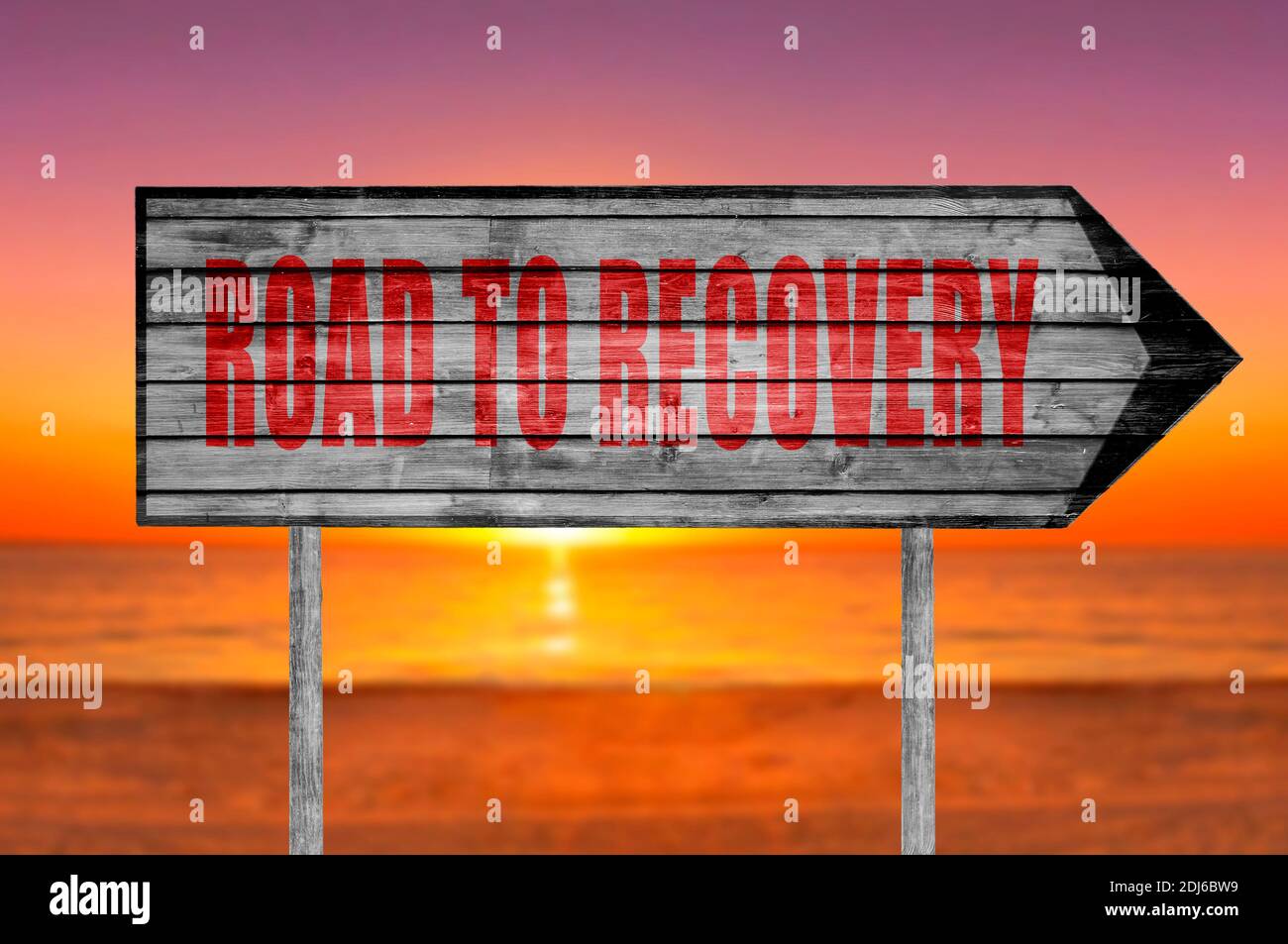 Red Road to Recovery wooden sign with on a beach background Stock Photo ...