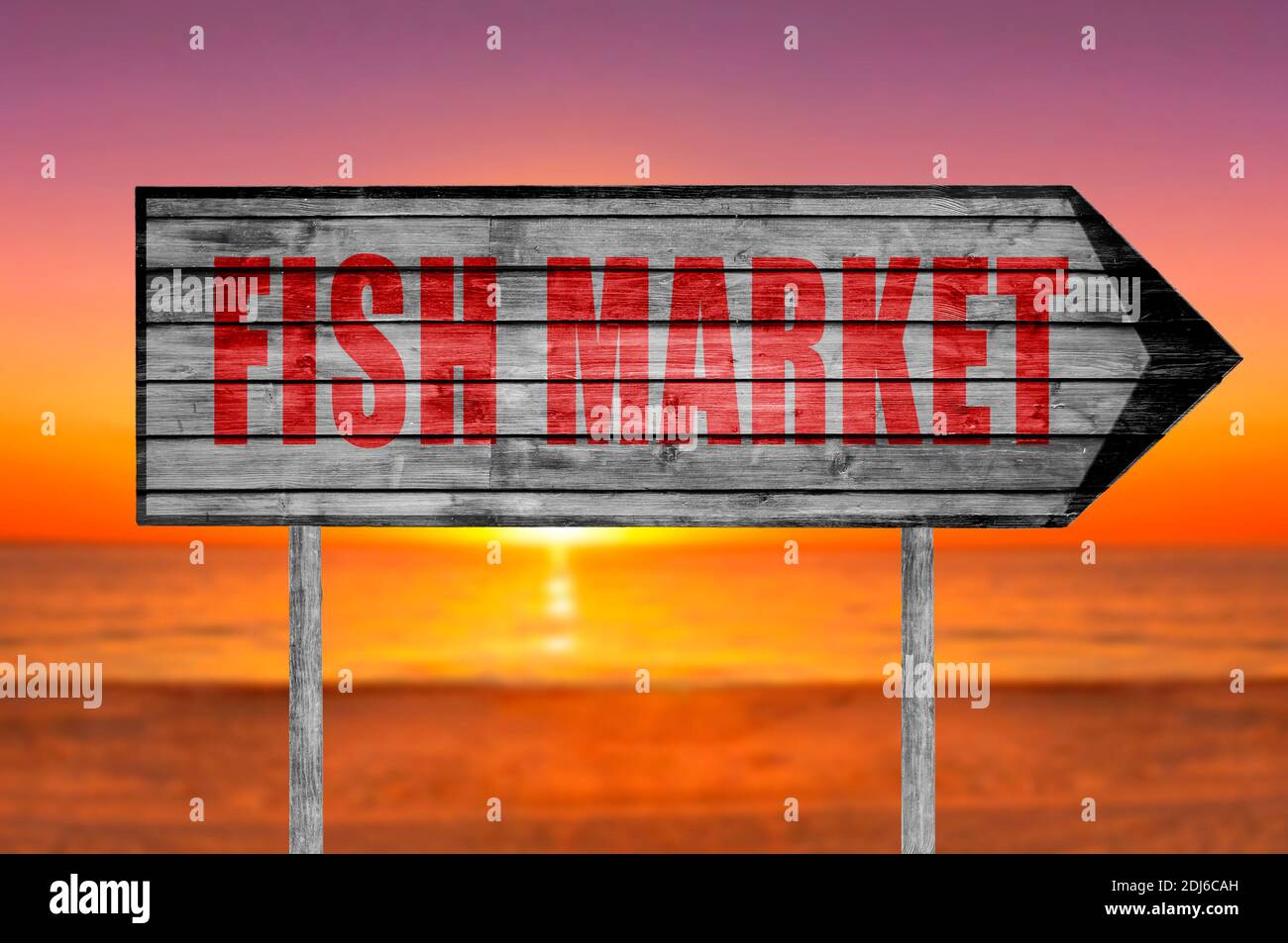 Red Fish Market wooden sign with on a beach background Stock Photo - Alamy