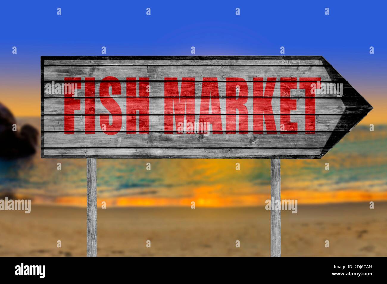 Red Fish Market wooden sign with on a beach background Stock Photo - Alamy