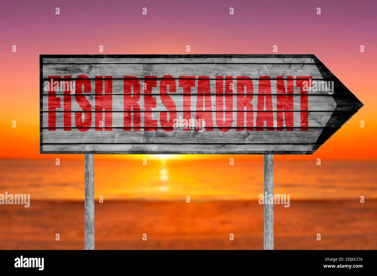 Red Fish Restaurant wooden sign with on a beach background Stock Photo ...