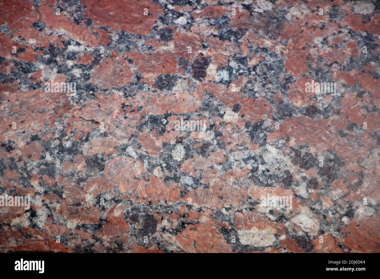 Red granite natural polished stone tile texture Stock Photo - Alamy